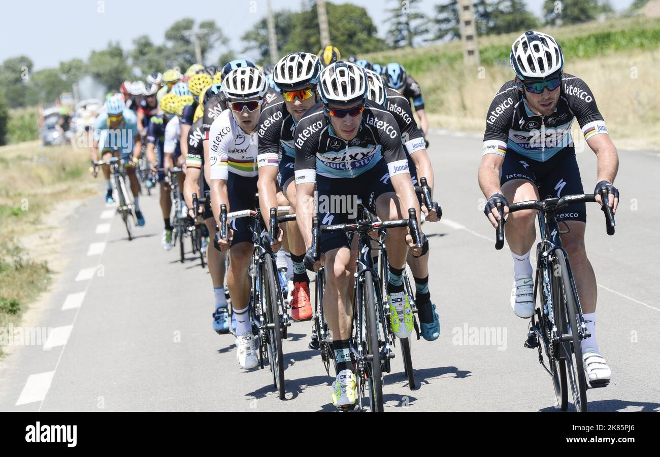 Mark Cavendish of team Etixx QuickStep rides at the front of the ...