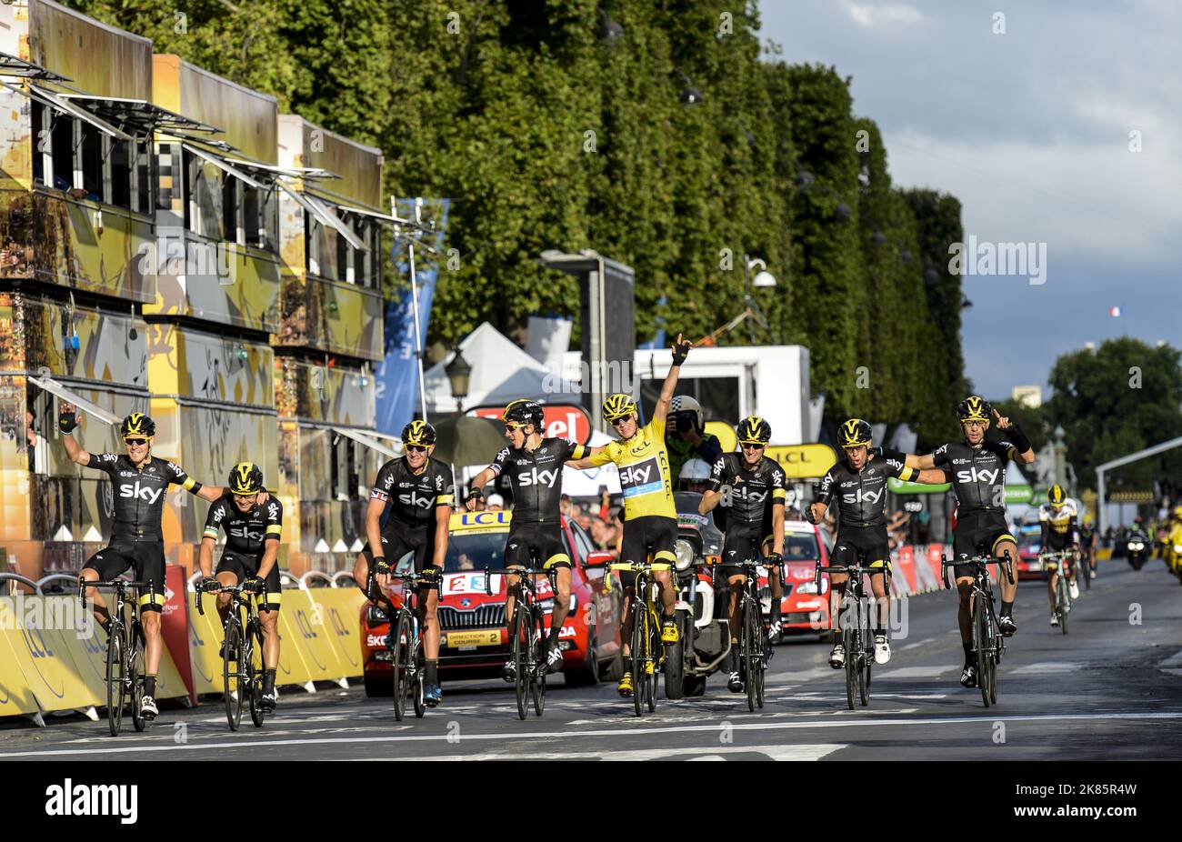 Chris Froome cycles the final circuit on the Champs Elysees after ...