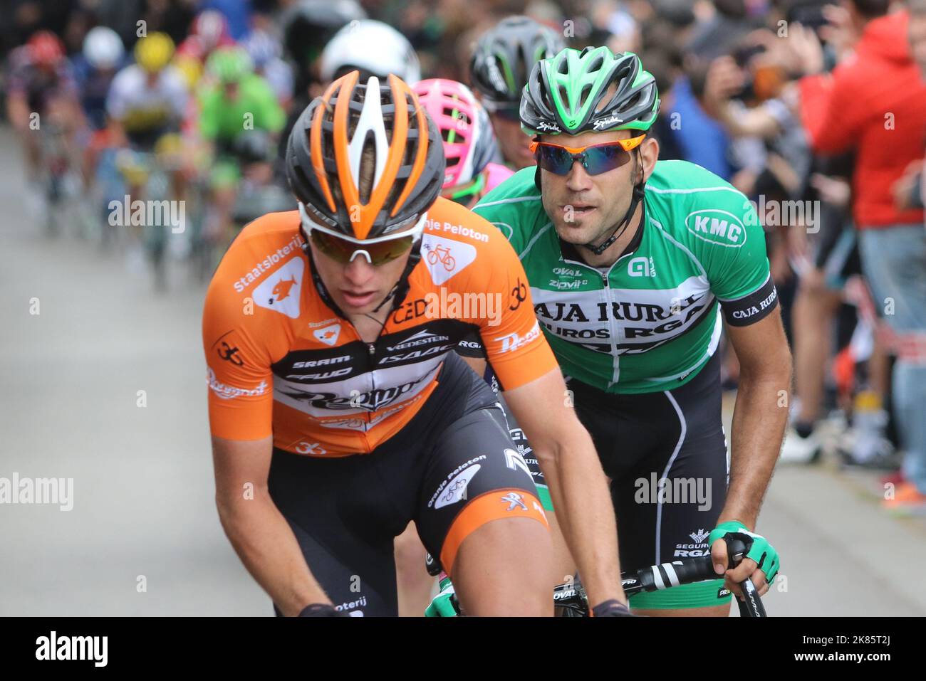 Rompot rider Boris Dron and Luis Mas of Caja Rural (right) lead on the ...