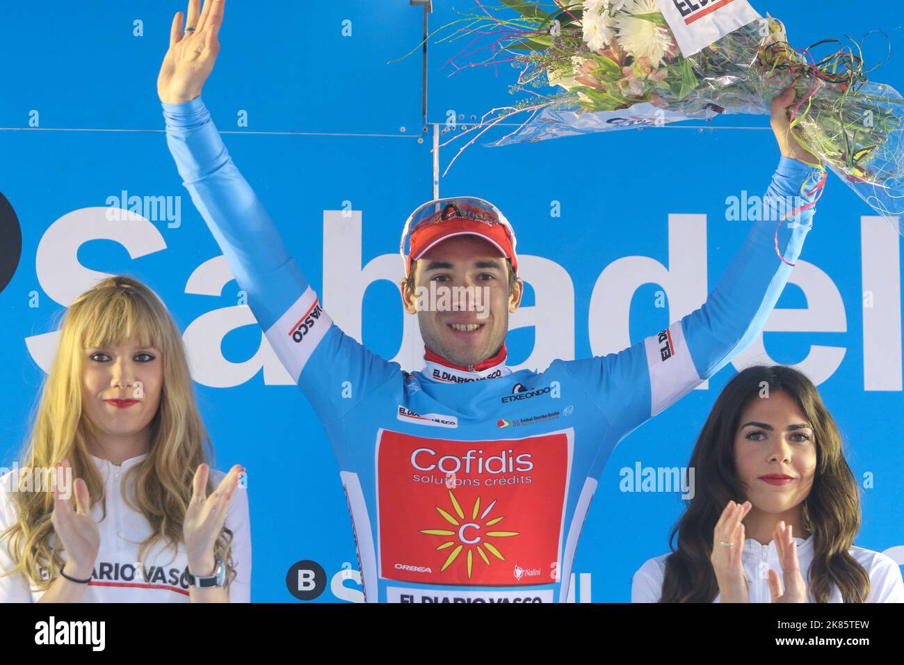 Nicolas Edet of Cofidis celebrates on the podium after retaining the ...