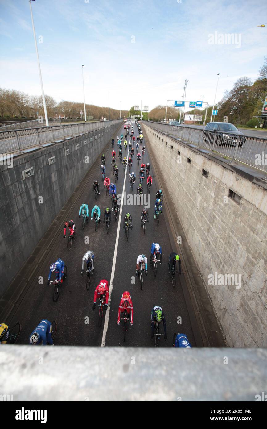 The Peloton Rolls out of Liege city centre at the start of the 2016 ...