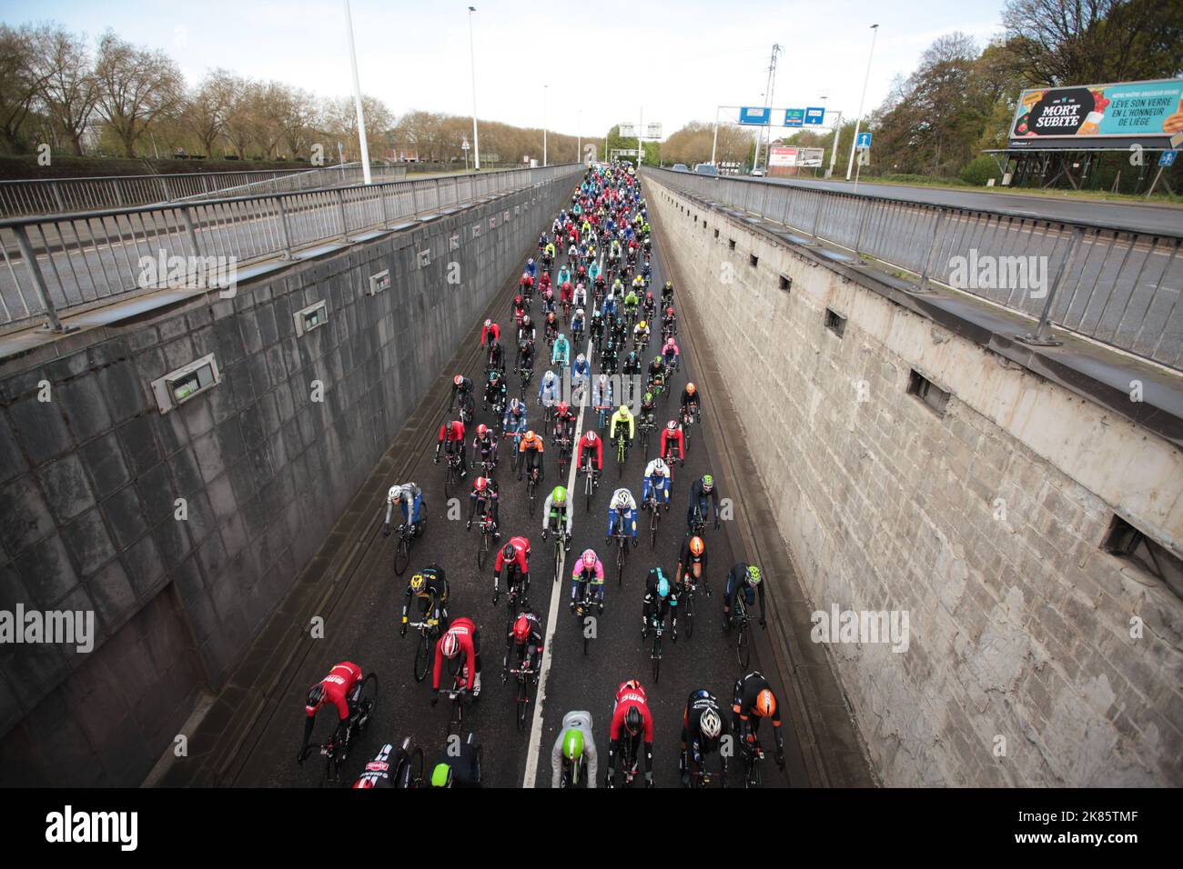 The Peloton Rolls out of Liege city centre at the start of the 2016 ...