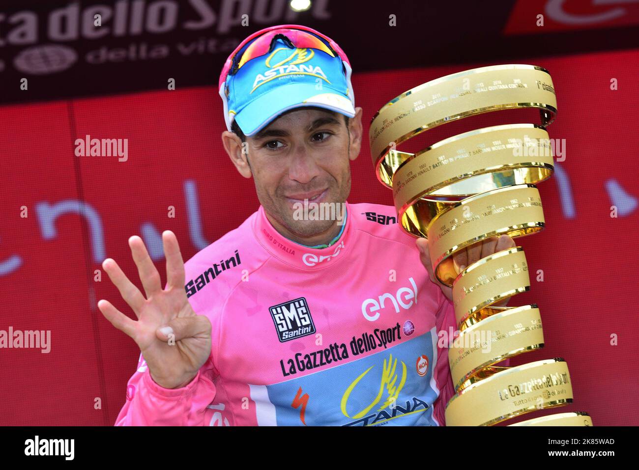 Vincenzo Nibali celebrates with the trophy on the podium after becoming ...