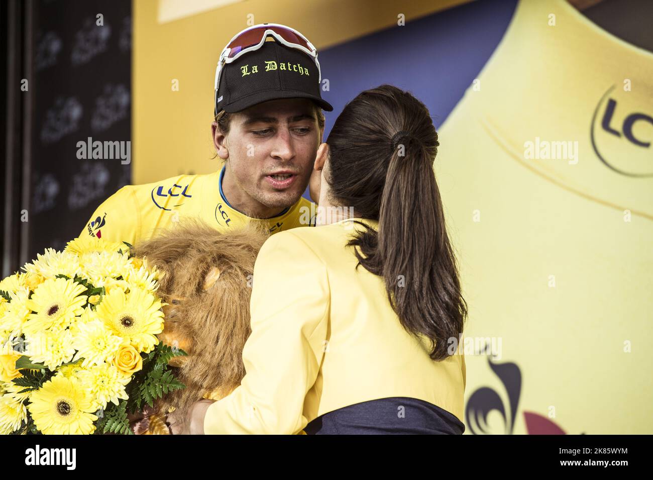 Peter Sagan team Tinkoff, takes to the podium after winning the stage ...