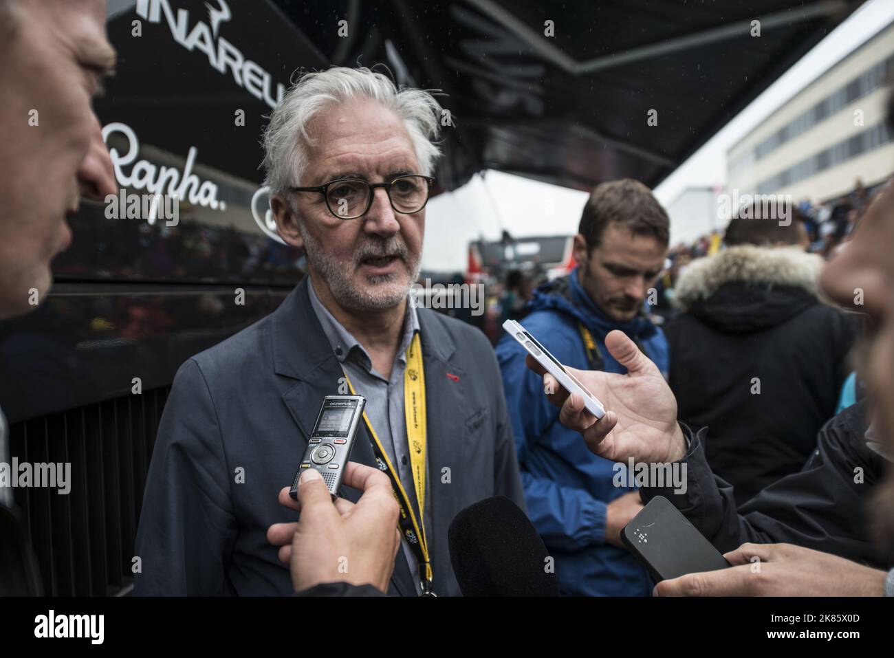 Brian Cookson UCI President is interviewed outside the Sky team bus ...