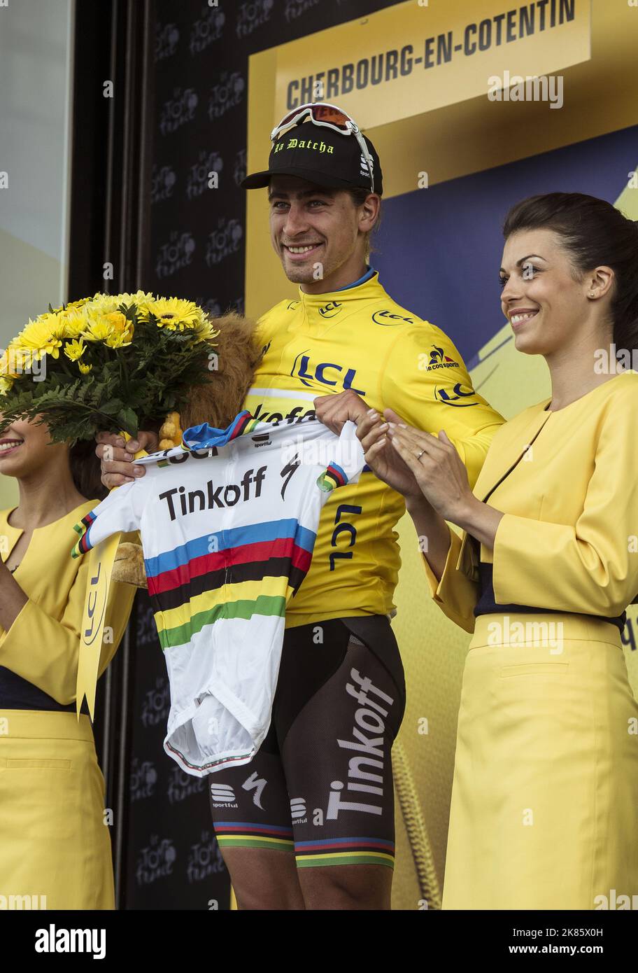 Peter Sagan team Tinkoff, takes to the podium after winning the stage ...