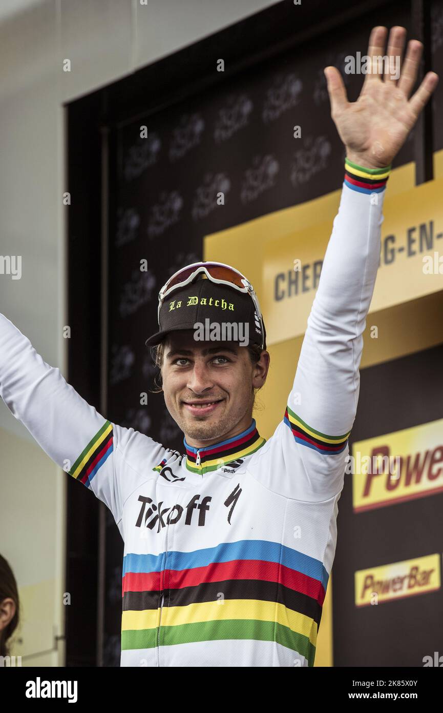Peter Sagan team Tinkoff, takes to the podium after winning the stage ...