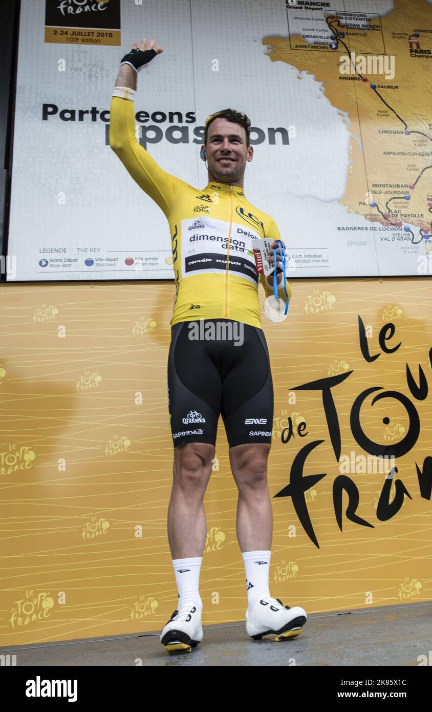 Mark Cavendish team Dimension Data arrives on stage and is handed a ...