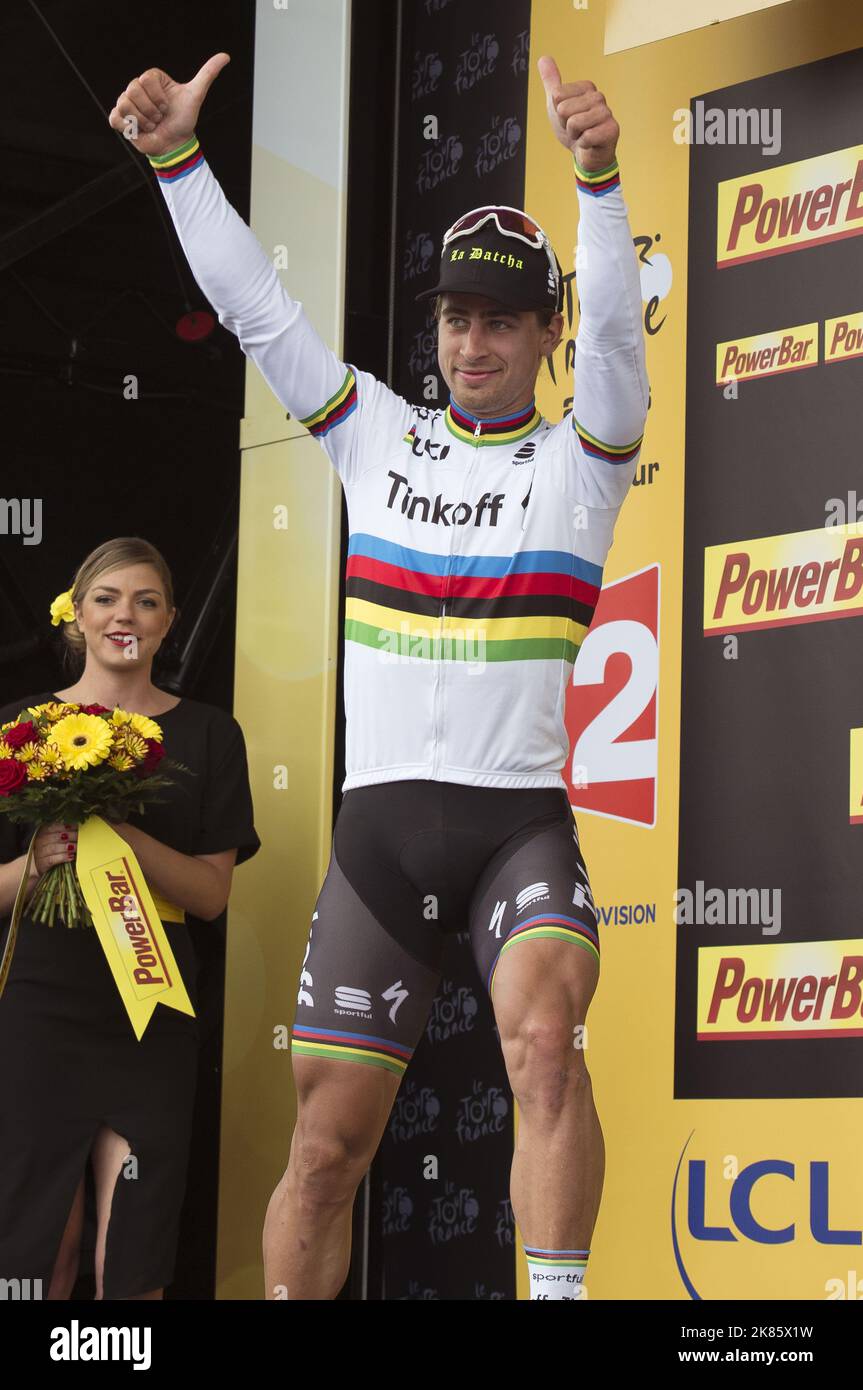 Peter Sagan team Tinkoff, takes to the podium after winning the stage ...