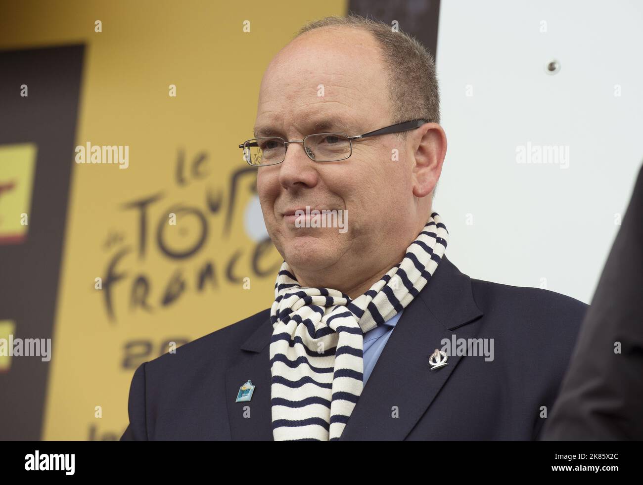 Prince Albert of Monaco stands on the podium to congratulate the ...