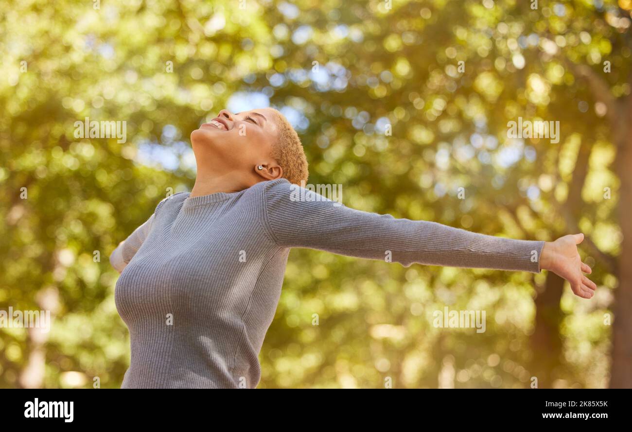 Happy, woman and freedom in nature park, sunlight and natural fresh air ...