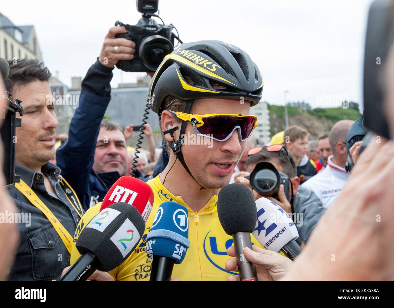 World Champion Peter Sagan in the yellow jersey is surrounded by the ...
