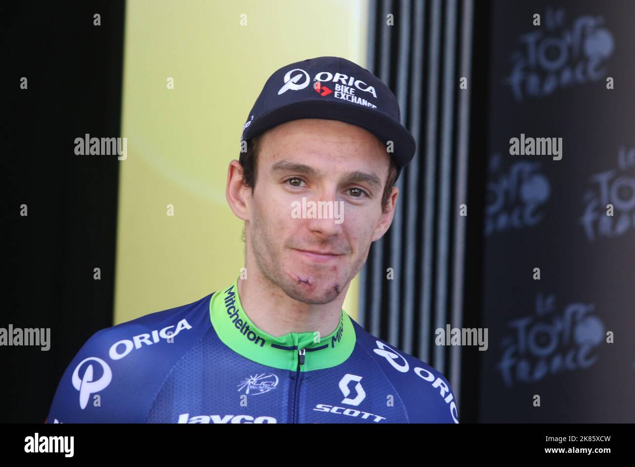 Adam Yates GB orica keeps white jersey and shows scars of yesterdays ...