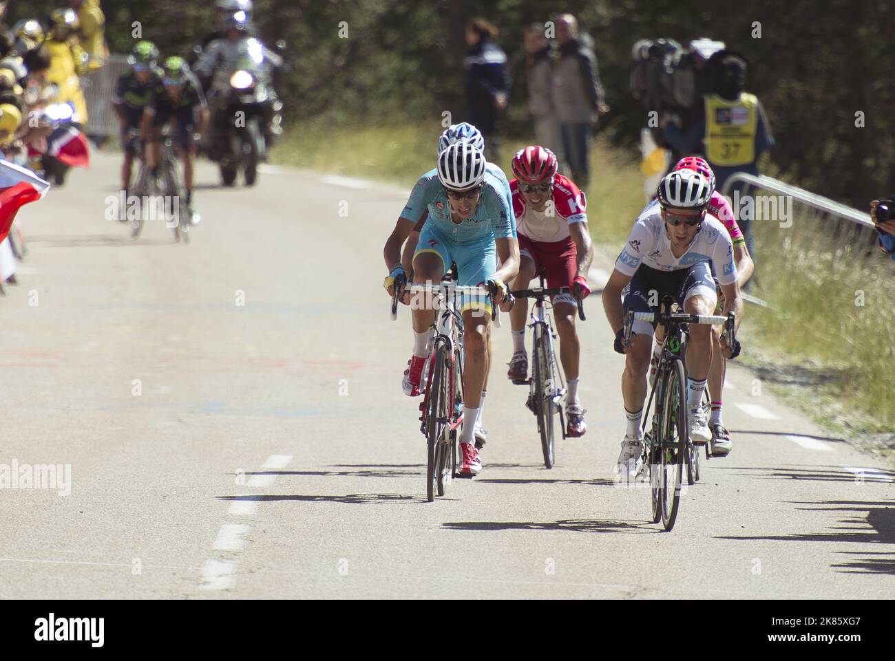 Adam Yates GB Orica in the white jersey of best young rider crosses the ...