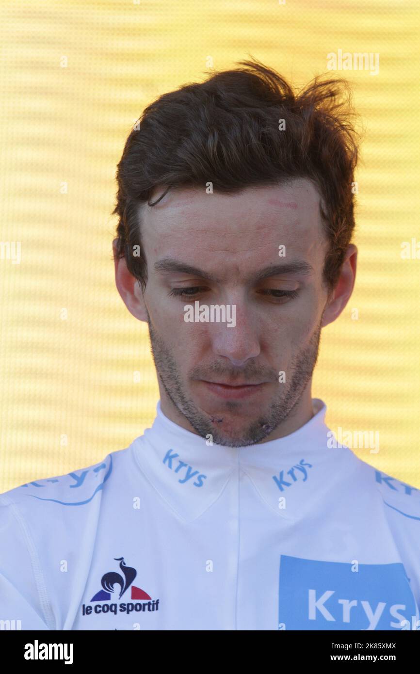Adam Yates in White Jersey on podium Stock Photo - Alamy