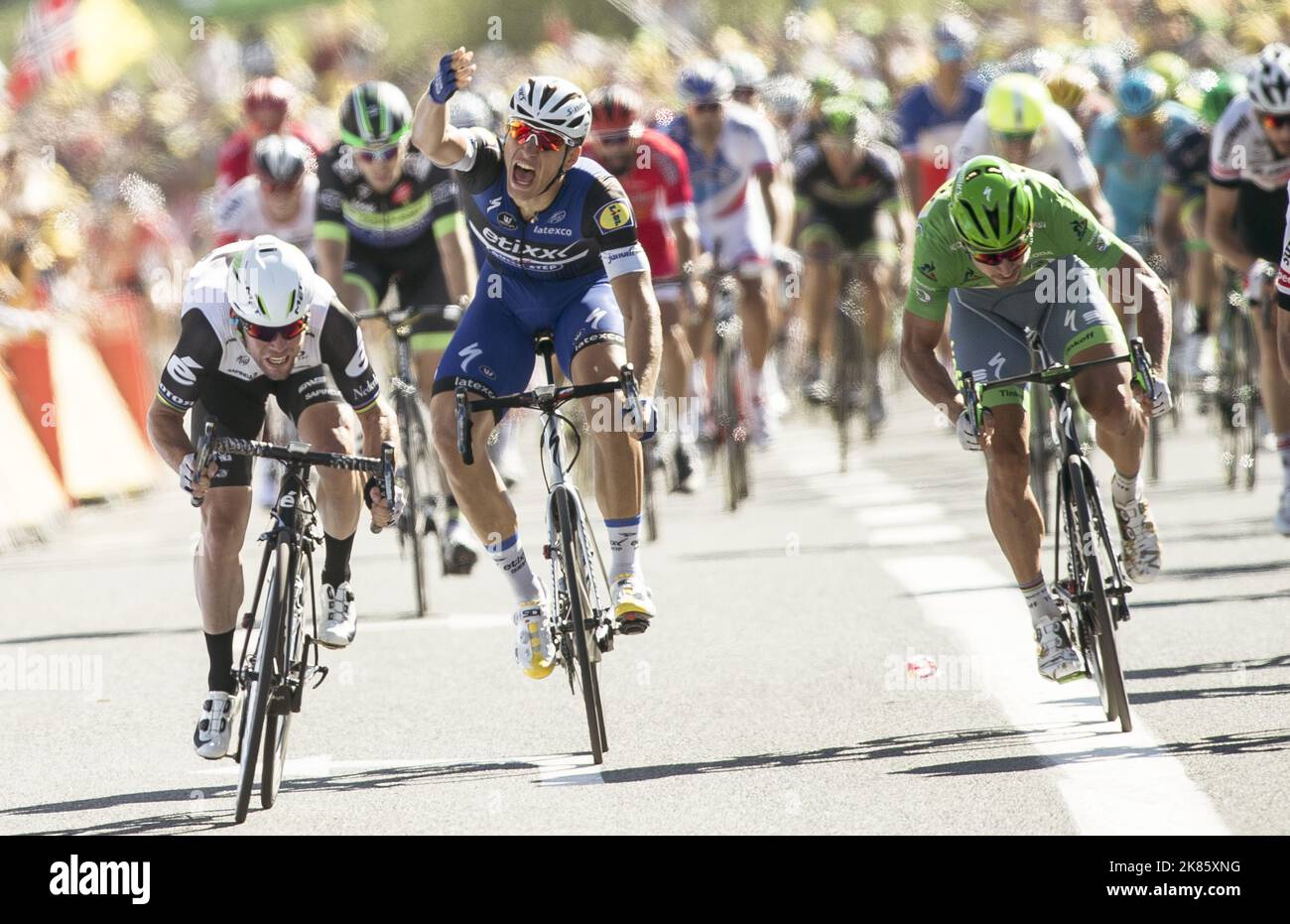 Mark Cavendish (GB) of Team Dimension Data wins the stage in a sprint ...