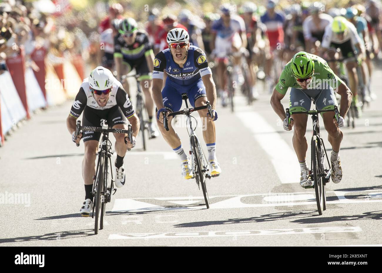 Mark Cavendish of Team Dimension Data wins the stage in a sprint finish ...