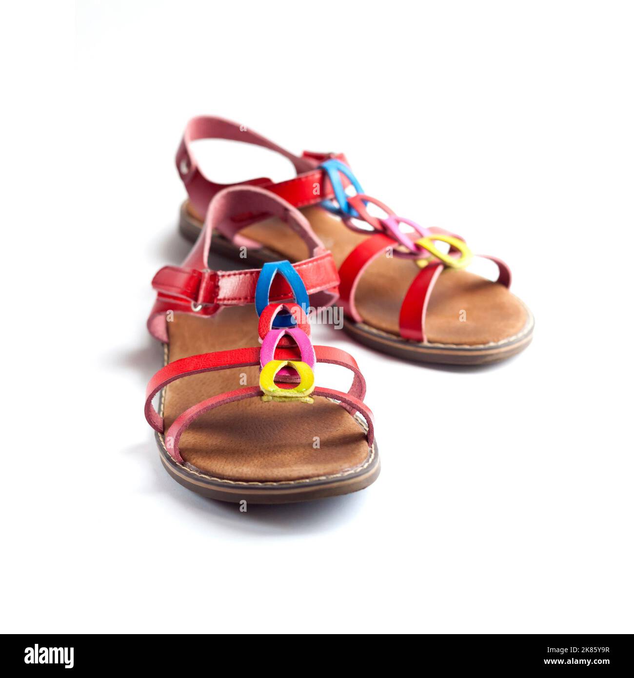 Pair of colorful female sandals isolated on white background Stock ...