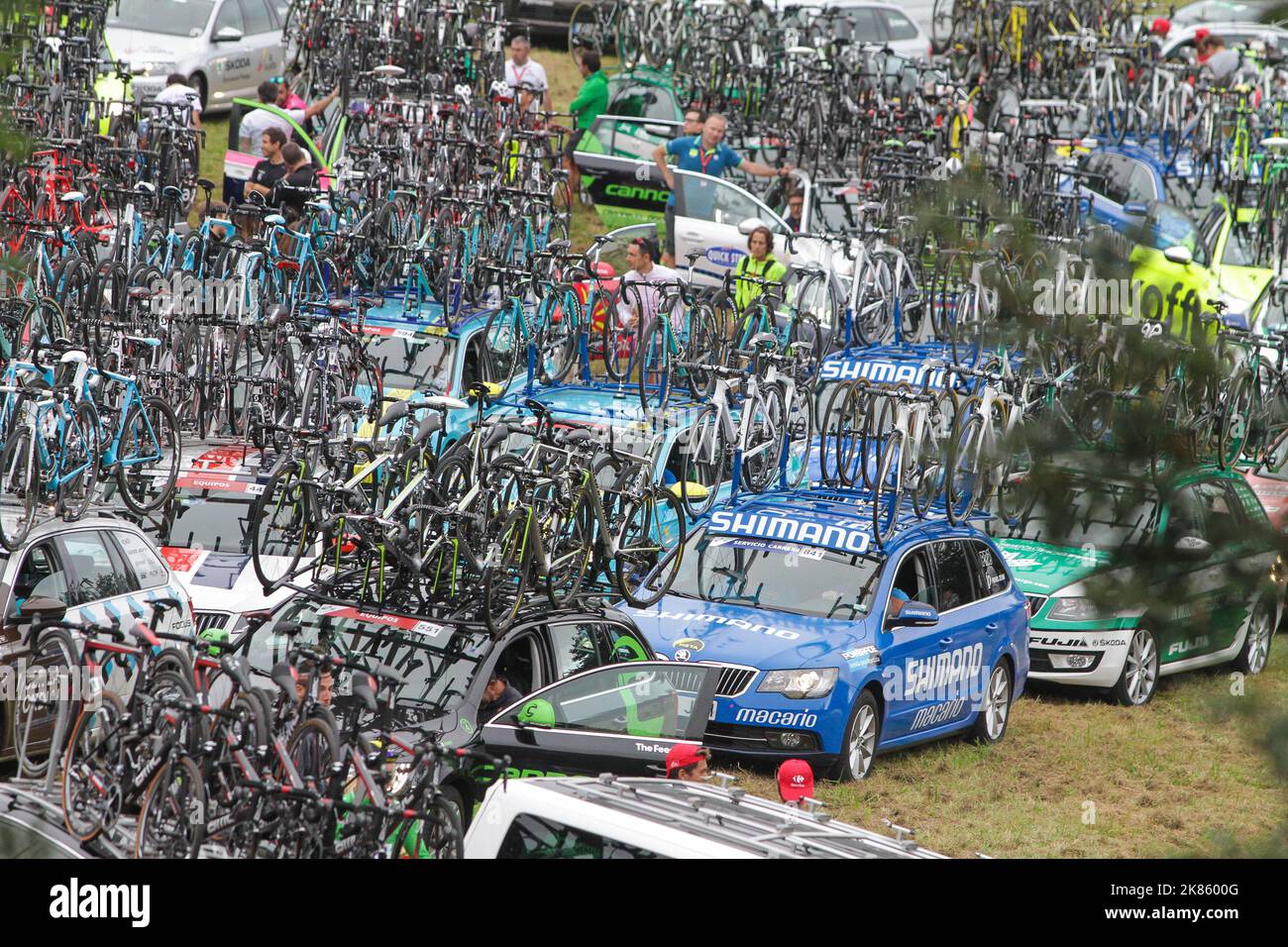 Car Park Chaos with a mass of team cars exiting the finish area after ...