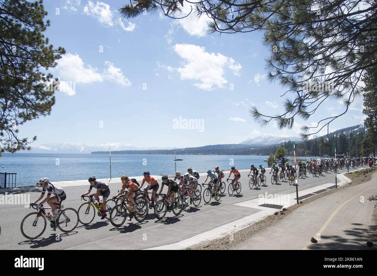 The women's peloton rides past Lake Tahoe in Tahoe PInes, (Photo by ...