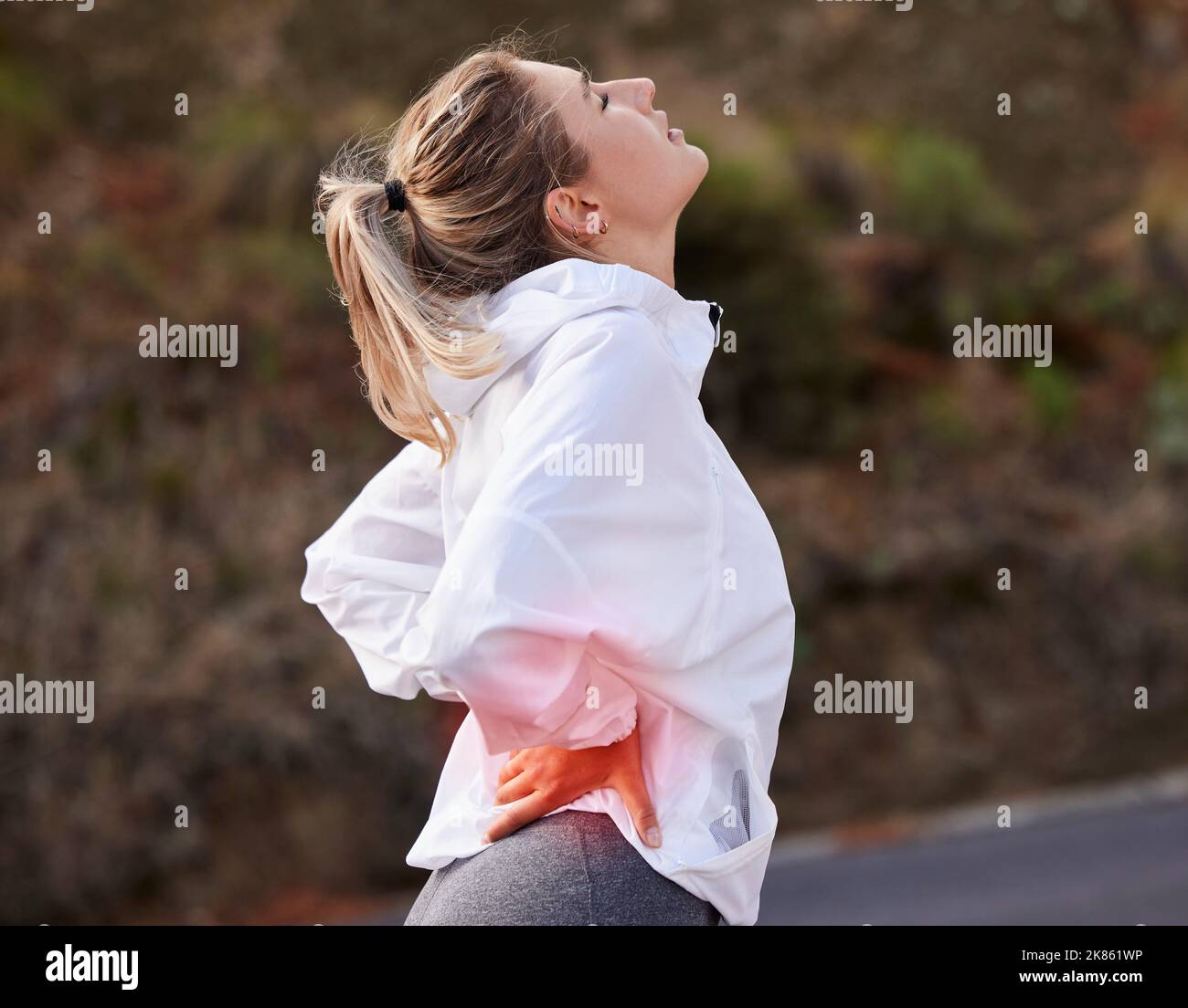 Woman, back pain and exercise, fitness injury and muscle ache ...