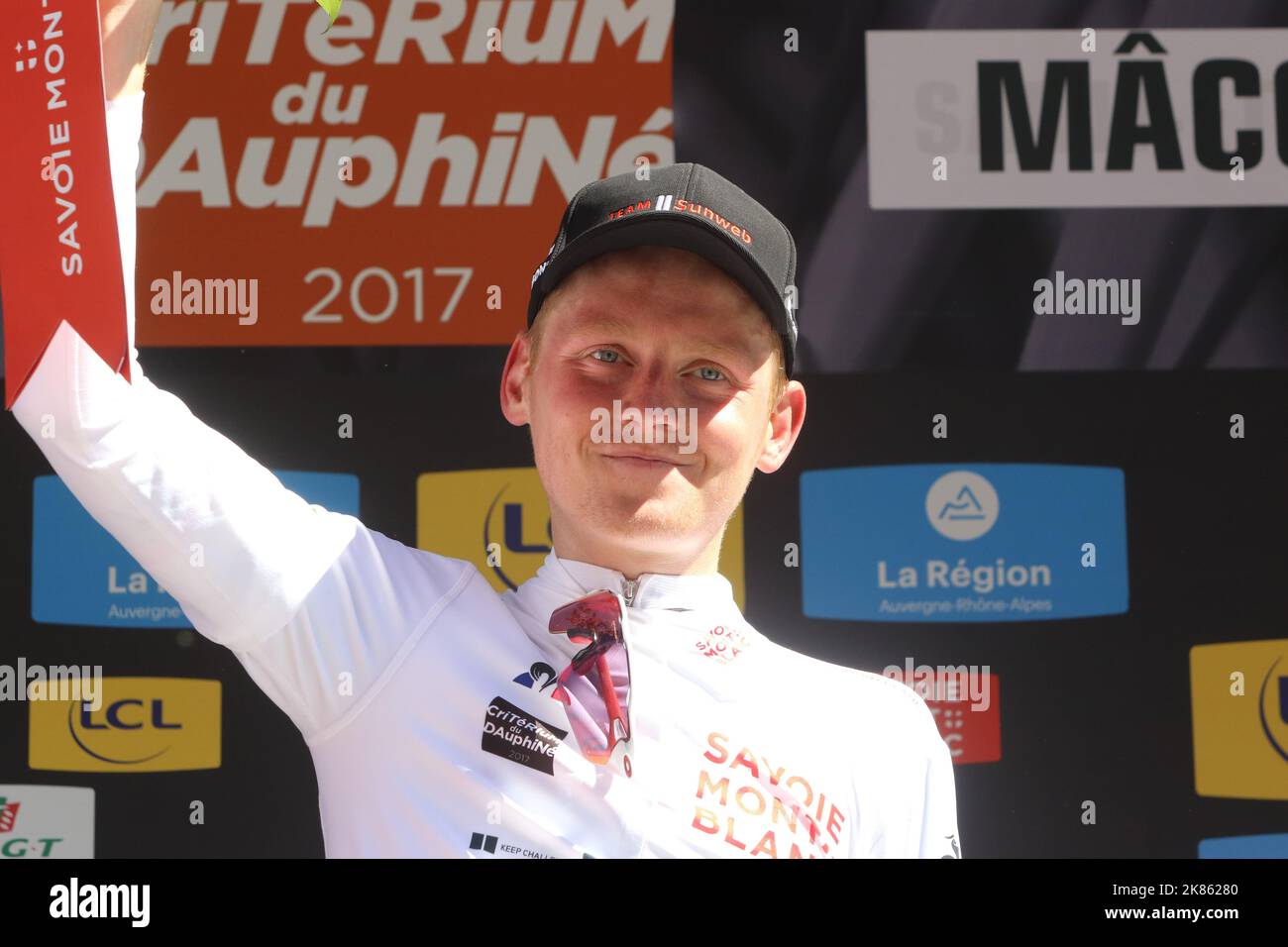Sam Oomend of team Sunweb in young riders jersey on the podium after ...
