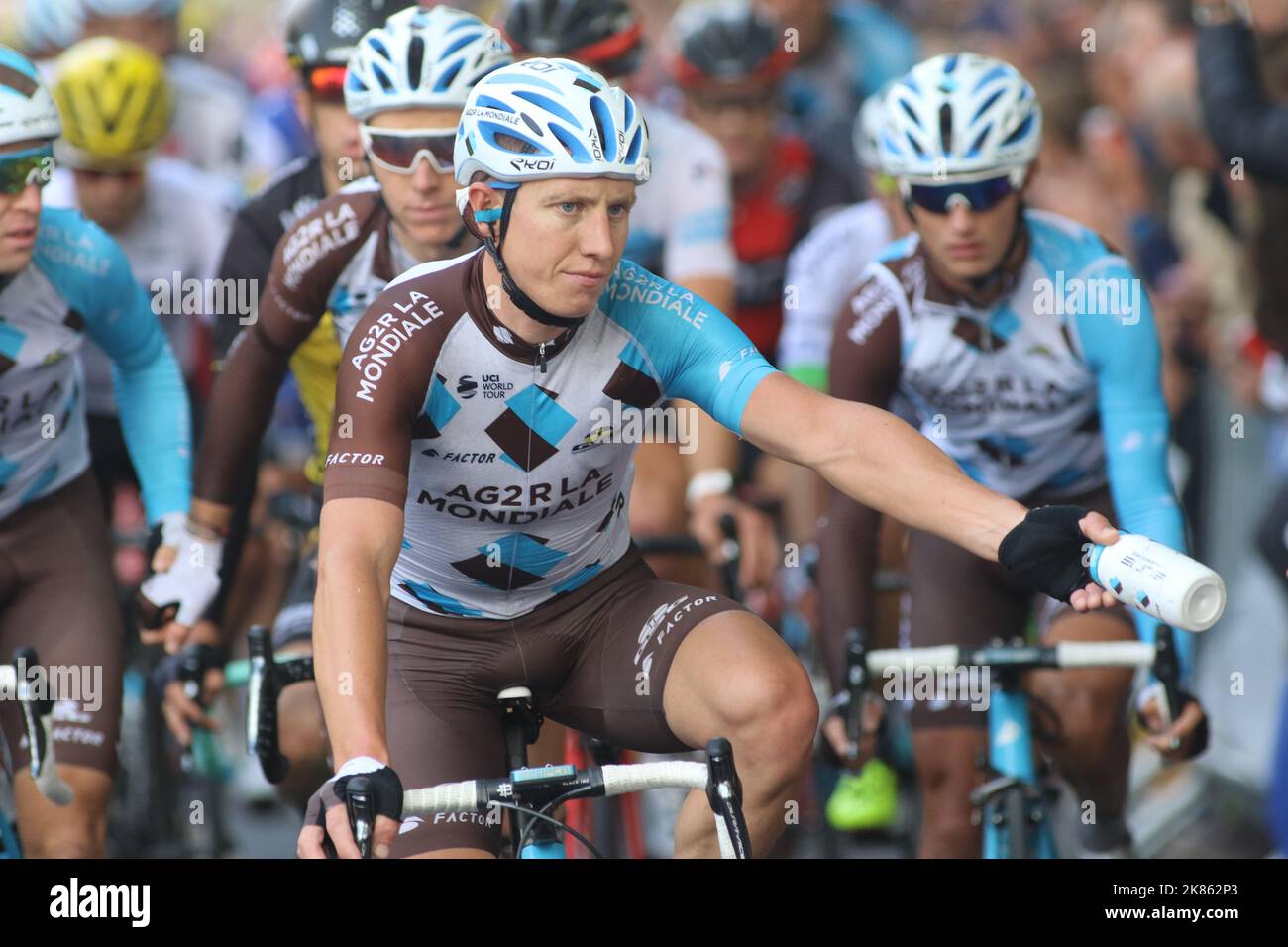 Cyril Gaultier France hands bottle to fan at finish line in liege Stock ...