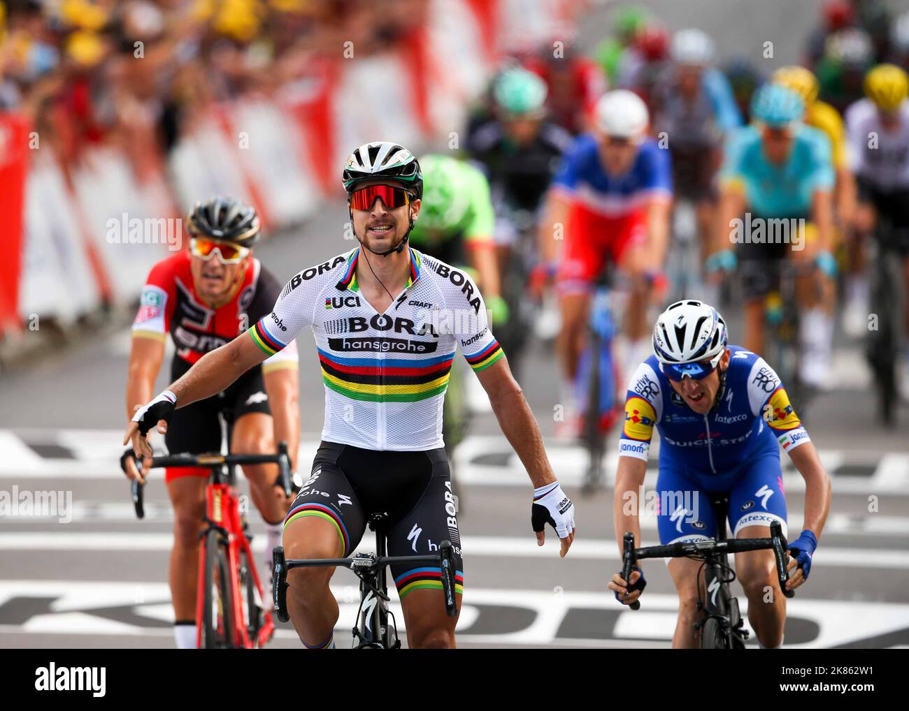 World Road Race Champion Slovakian Peter Sagan celebrates the stage win ...