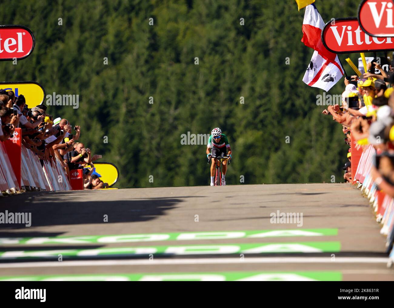 Italian National Road Race Champion (Astana) crests the brow of the ...
