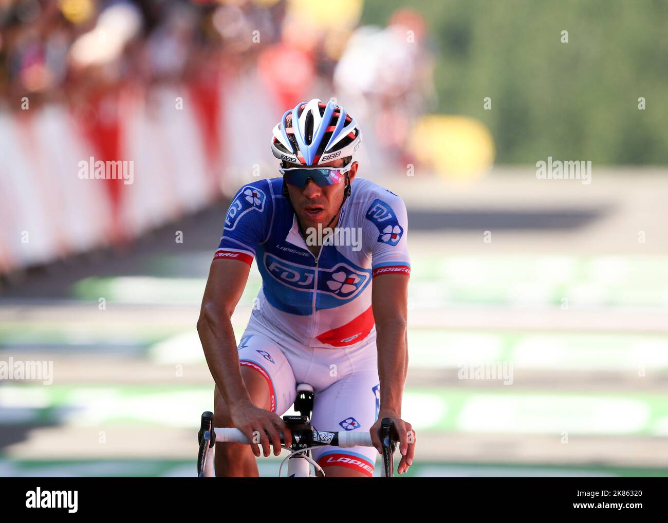 France's Thaibaut Pinot (FDJ) crosses the finish line after a touch ...