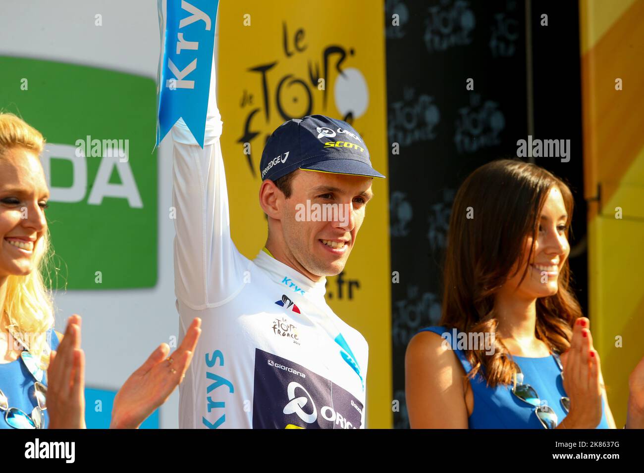 Britains Simon Yates (Orica) on the podium having stayed at the top of ...