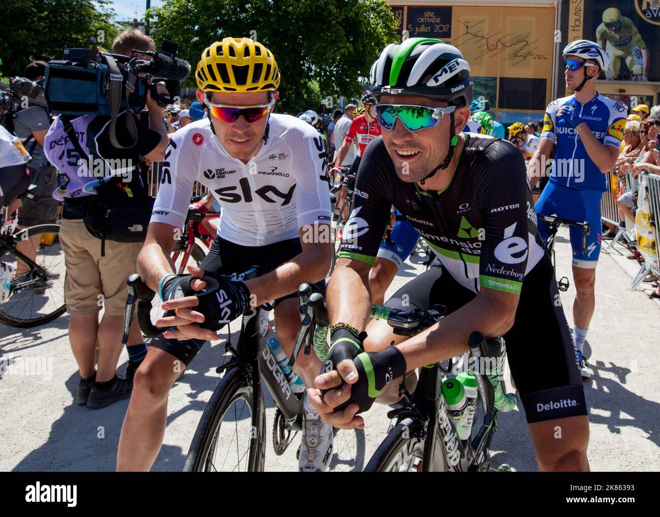 Switzerlands Bernhard Eisel (Dimension Data) and Wales's Luke Rowe (Sky ...