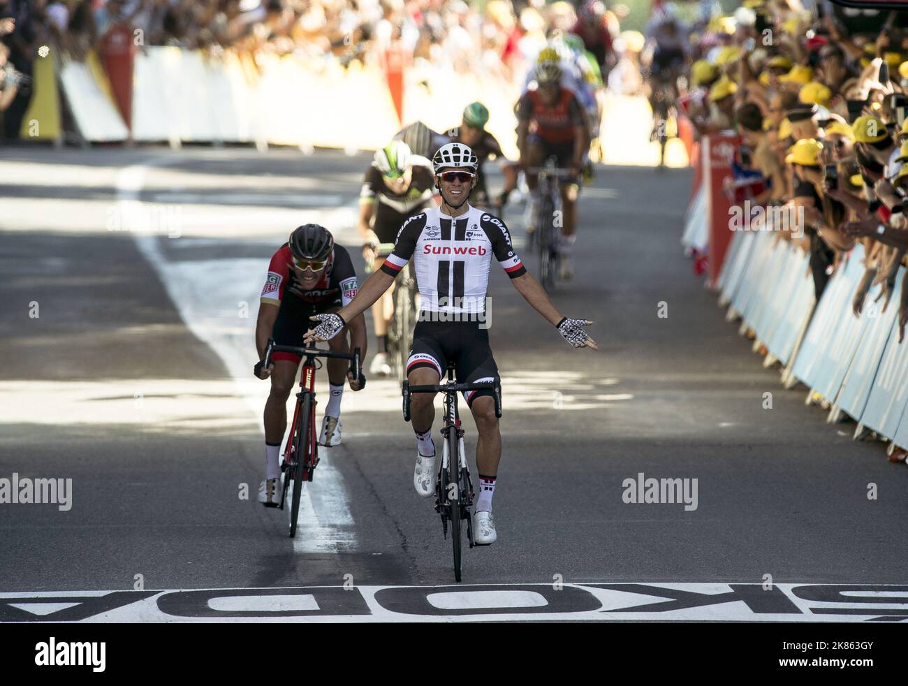 Australia's Michael Matthews Sunweb team crosses the finish line to win ...