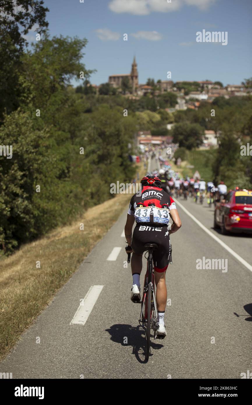 BMC racing team's Alessandro de Marchi collects drinks for his team ...