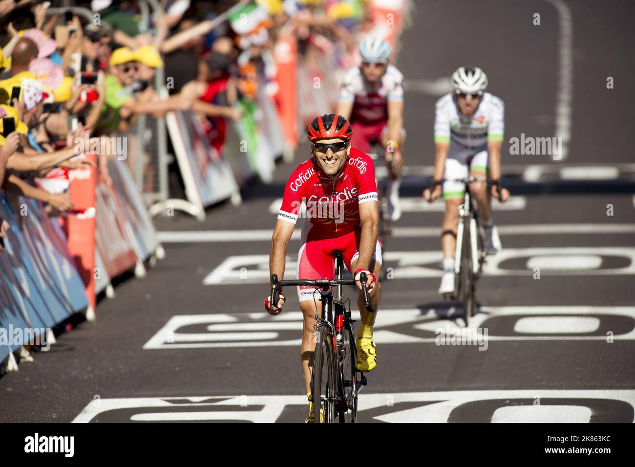Spain's Luis Angel Mate crosses the finish line in 18th position in the ...