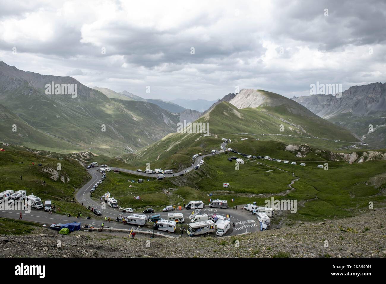 The Galibier on the 17th stage of racing campervans and fans line the ...