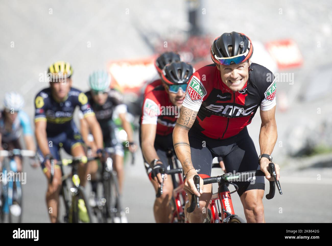 Ireland's Nicolas Roche team BMC climbs the final kms of stage 18 of ...