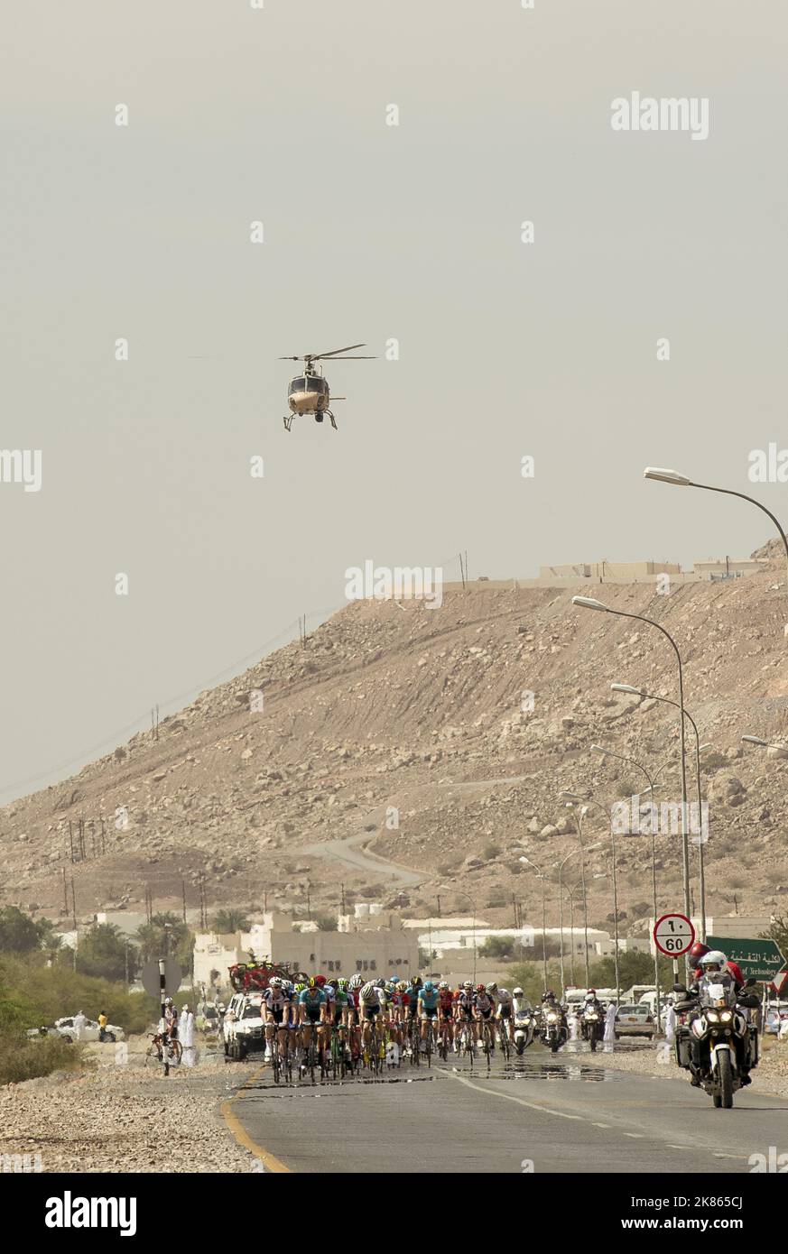 The peleton ride through the arid mountains of Jabal Al Akdhar in Oman ...