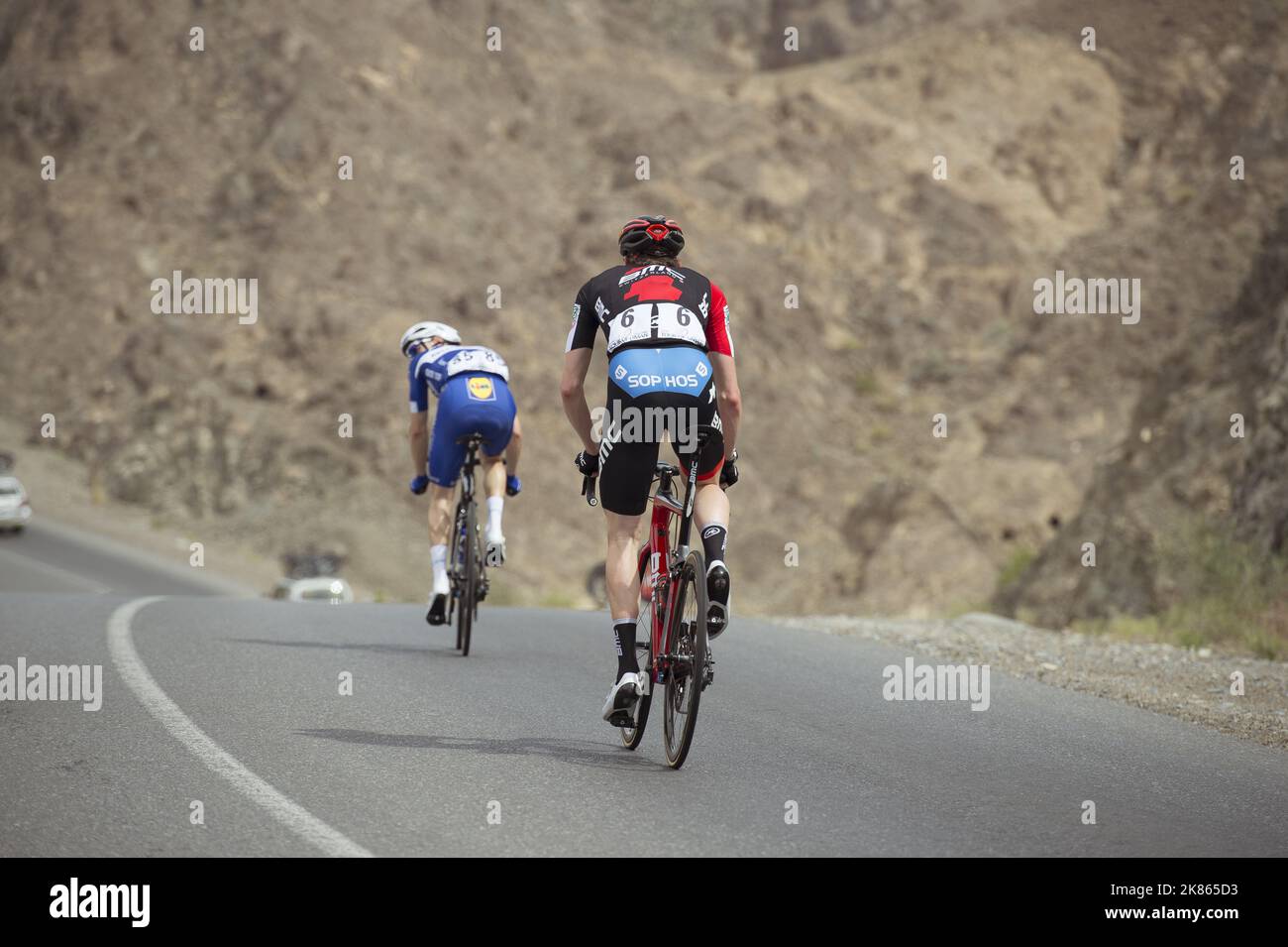 Belgian's Nathan Van Hooydonck rides behind Dryes Devenyns in the first ...
