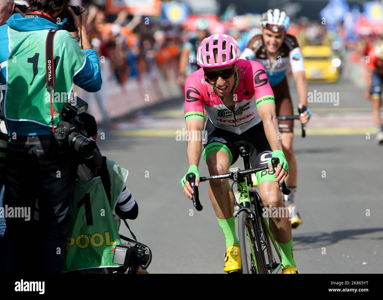 Canada's Michael Woods (Ef Drapac) swerves round the photographers ...