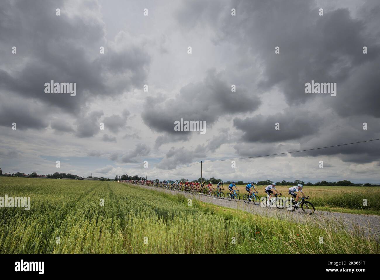 The peloton ride through the French countryside on Stage 2 of the ...