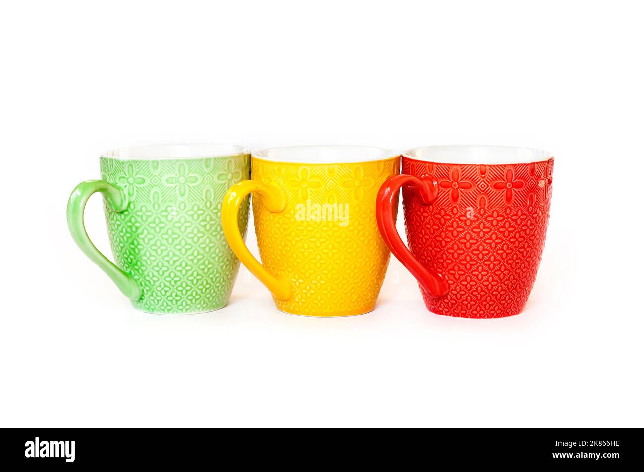 Line of three colorful cups isolated on white background Stock Photo ...