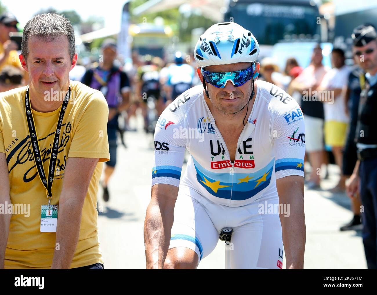Alexander KRISTOFF (UAE Emerites) squeezes through the crowd to get to ...