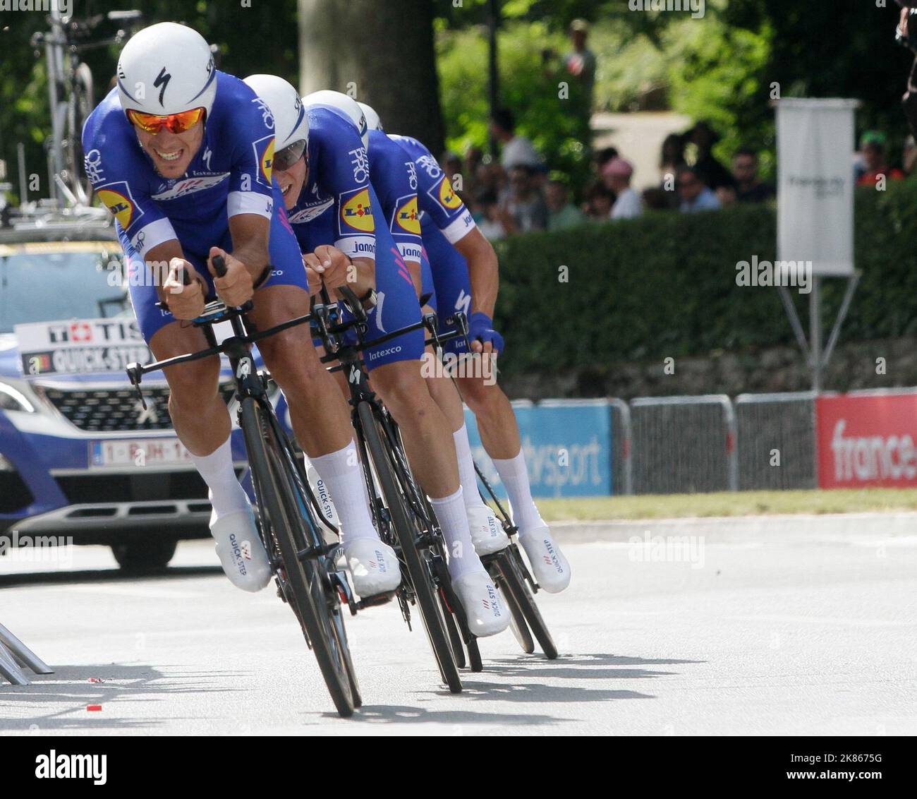 Quick Step led by Philip Gilbert Bel head towards the line Stock Photo ...