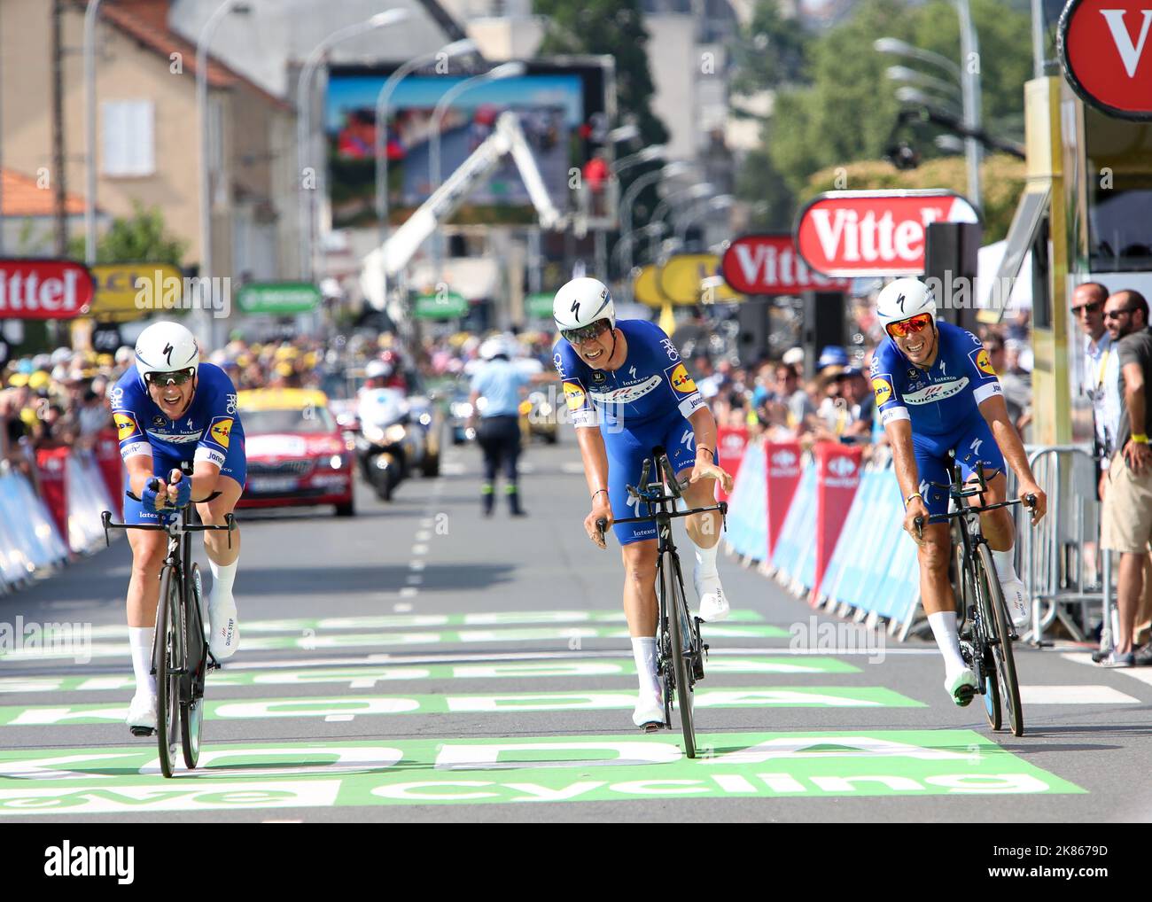Quick Step floors push to the finish line of the time trial Stock Photo ...