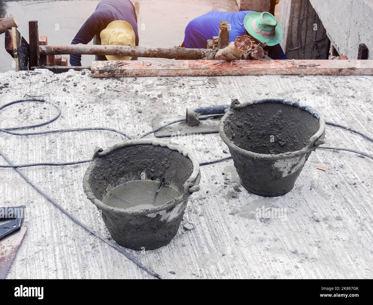 Cement tank for mixing mortar at a construction site with construction ...