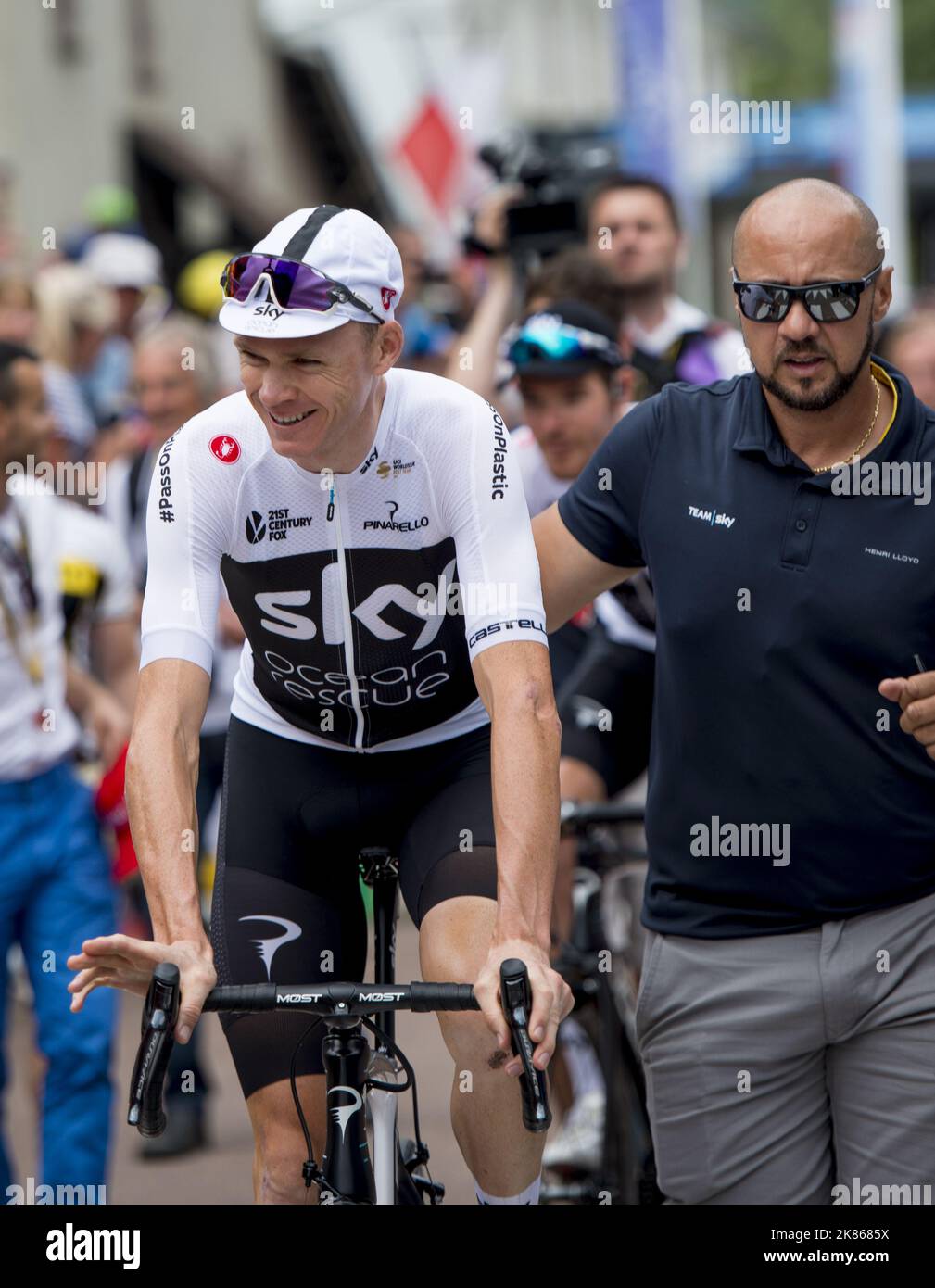 Great Britain's Chris Froome rides to sign to the race at the beginning ...