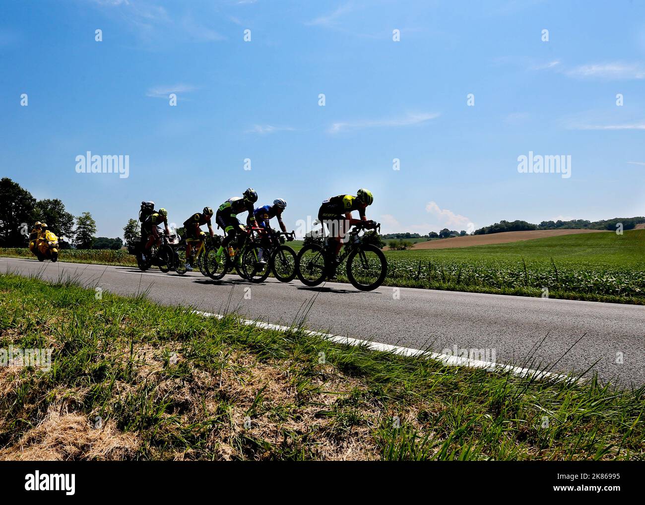 The early breakaway rides through the rolling country side on their way ...