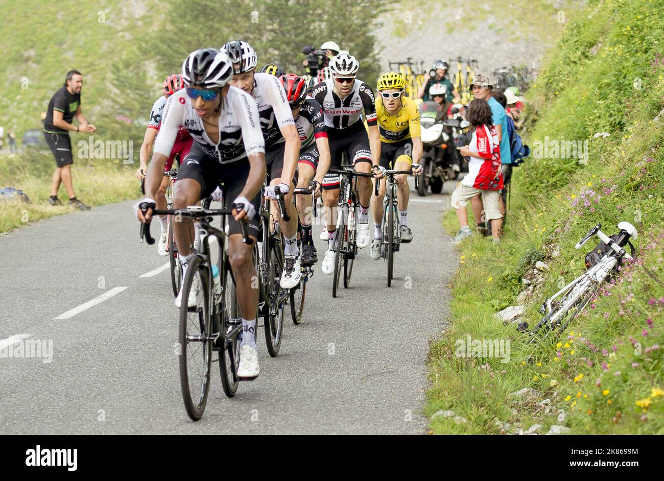Chris Froome is led out by Egan Arley Bernal Gomez then Dan Martin ,Tom ...