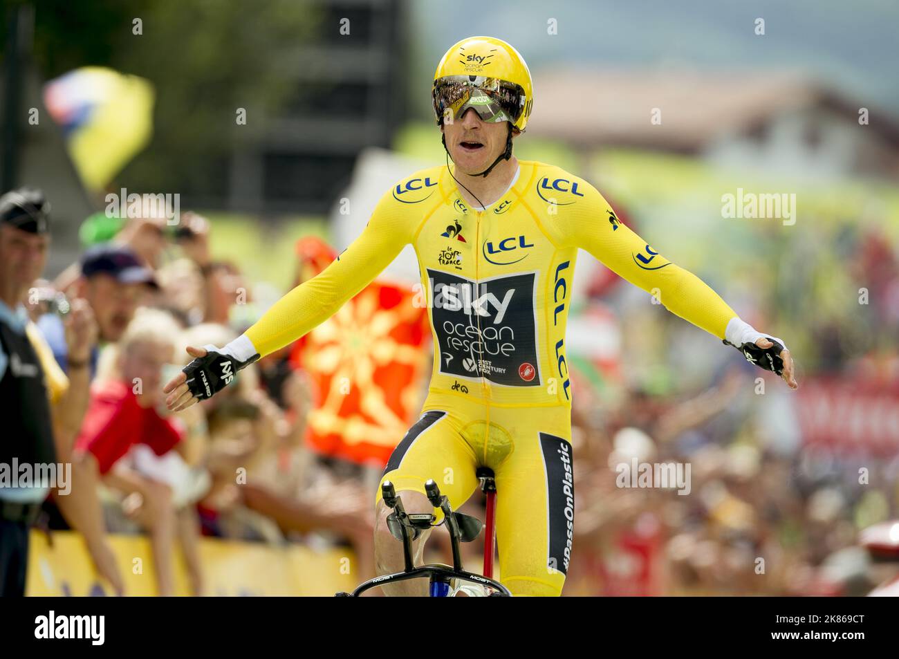 Great Britain's Geraint Thomas for team Sky crosses the finish line ...